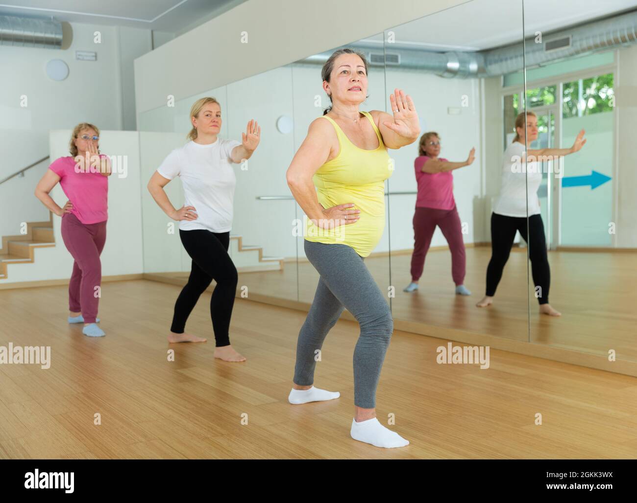 Three women are dancing Stock Photo - Alamy