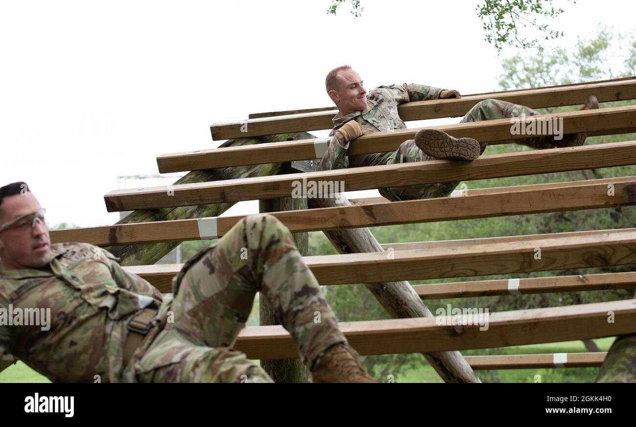 U.S. Army Staff Sgt. Jude Martin, top, and Sgt. 1st Class Dylan ...