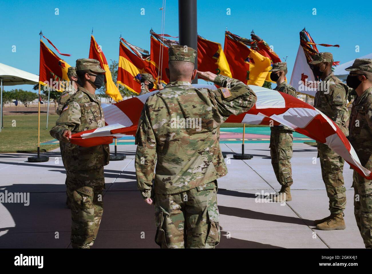Fort Bliss soldiers perform the traditional retreat ceremony with the ...