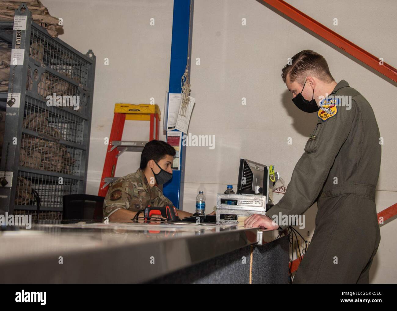 Airmen process through the personnel deployment function line at Davis-Monthan Air Force Base ...