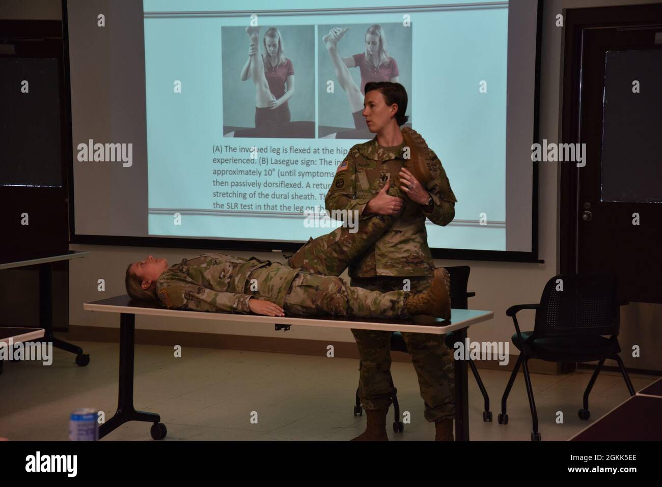 Capt. Kelly Scott, a physical therapist with the 2nd Brigade Combat ...