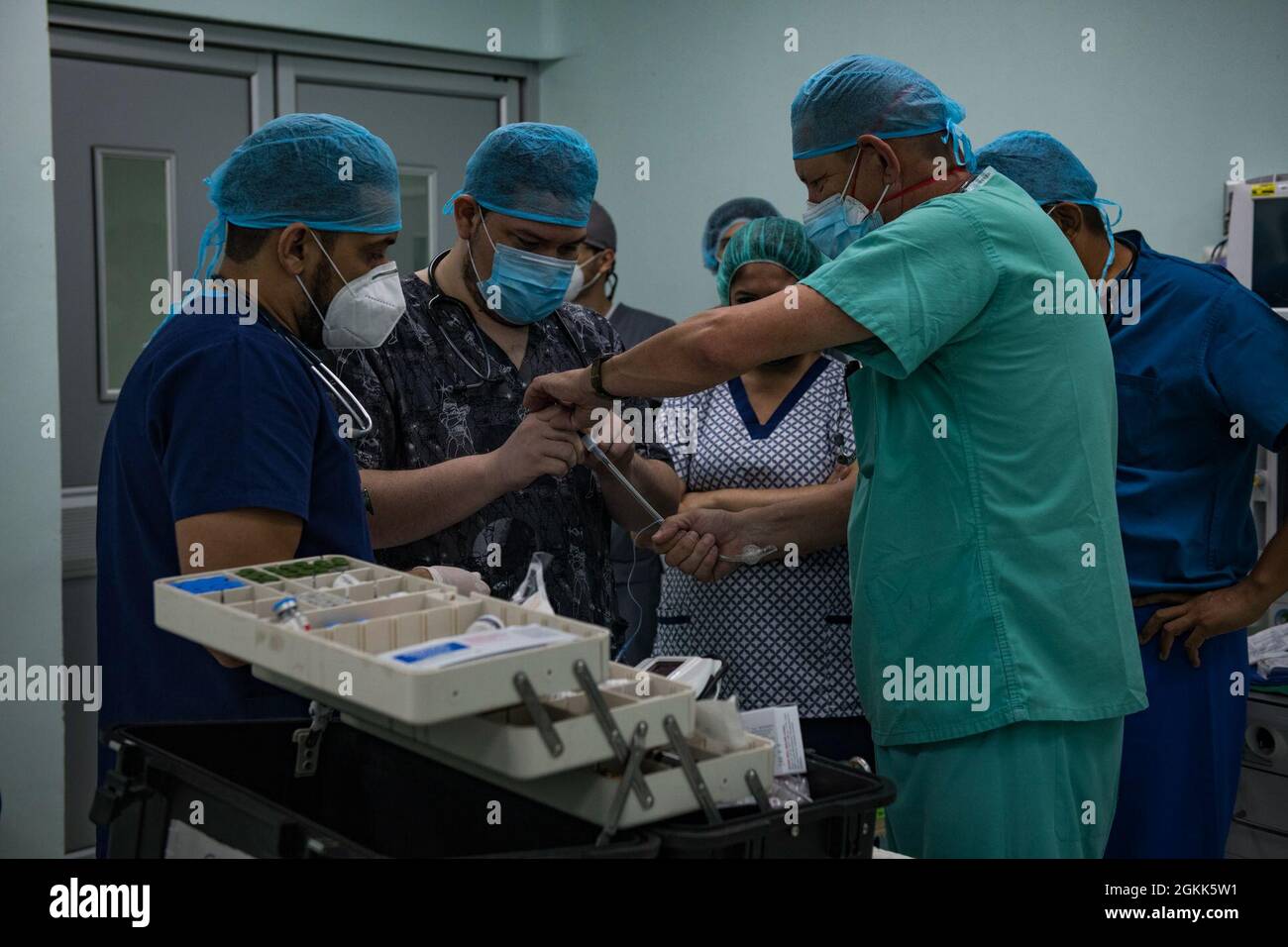 U.S. Army Col. William Kogl, right, a nurse anesthetist with the ...