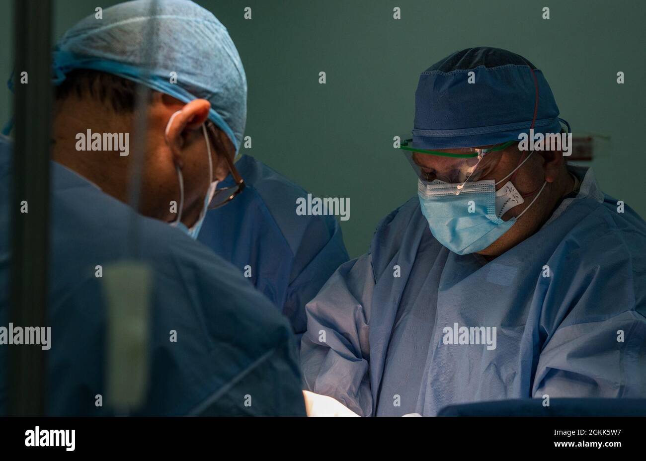U.S. Army Lt. Col. Jesse Moskowitz, right, a surgeon with the Forward ...