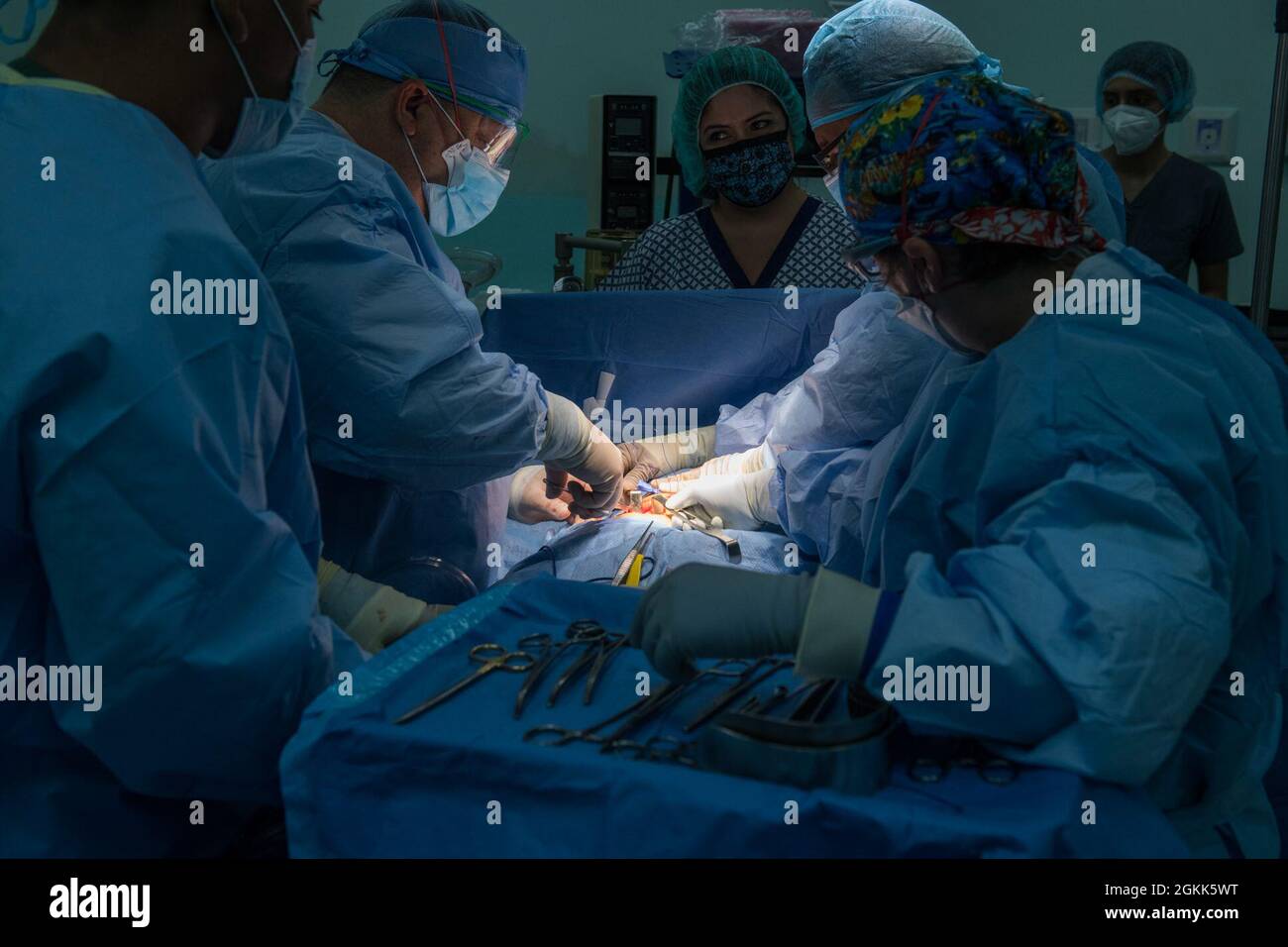 U.S. Army Lt. Col. Jesse Moskowitz, left, a surgeon with the Forward ...