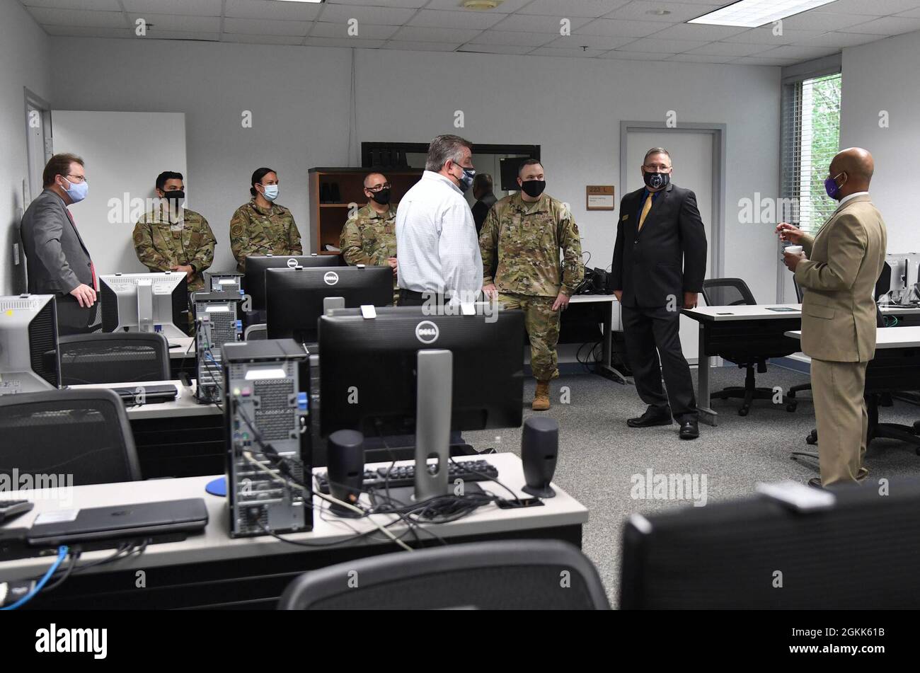 Keesler personnel tour the National Test Center room during the ...