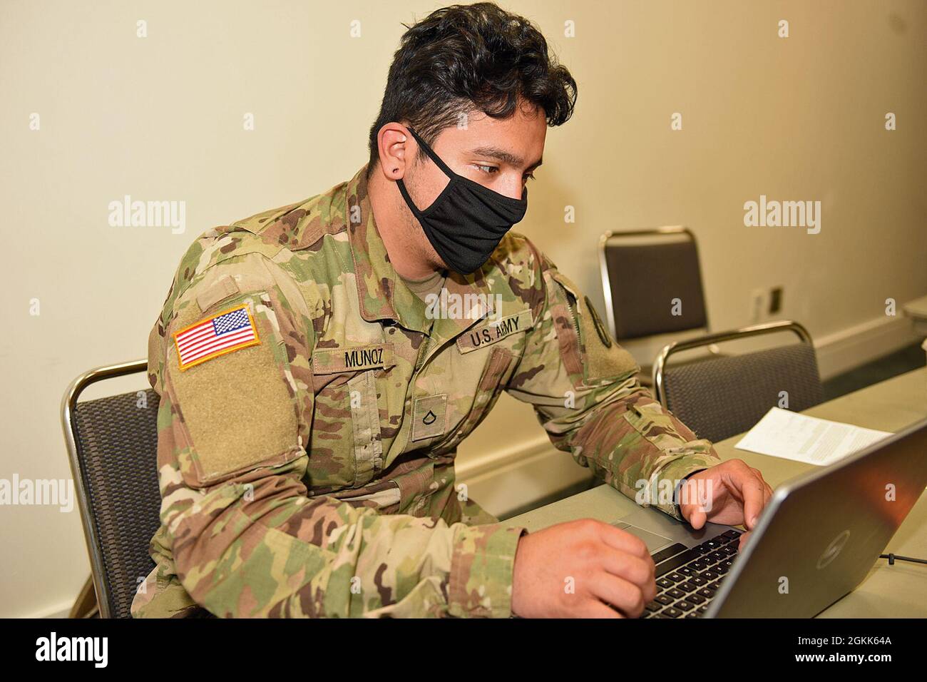 U.S. Army Pvt. Luis Munoz, a multiple launch rocket system crewmember ...