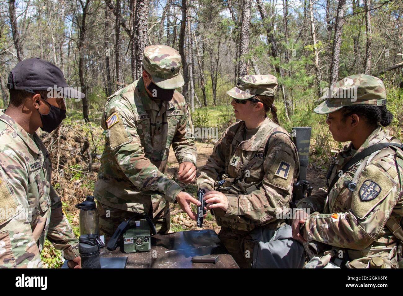Spc. Kyle Youngblood, an instructor for an expert field medical badge ...