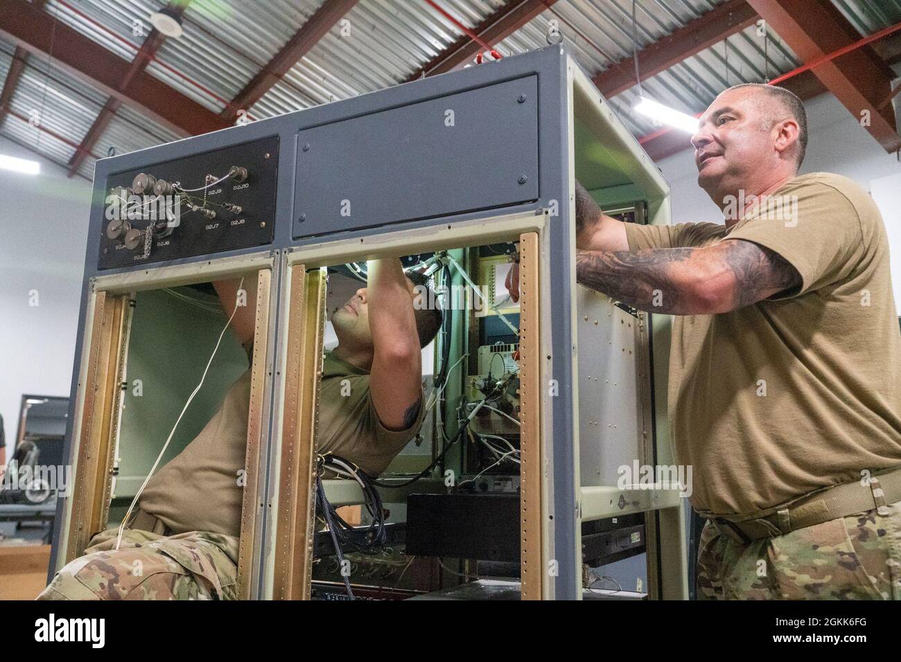 Senior Airman Warren Reynier and Master Sgt. Alexander Mitchell, 403rd ...