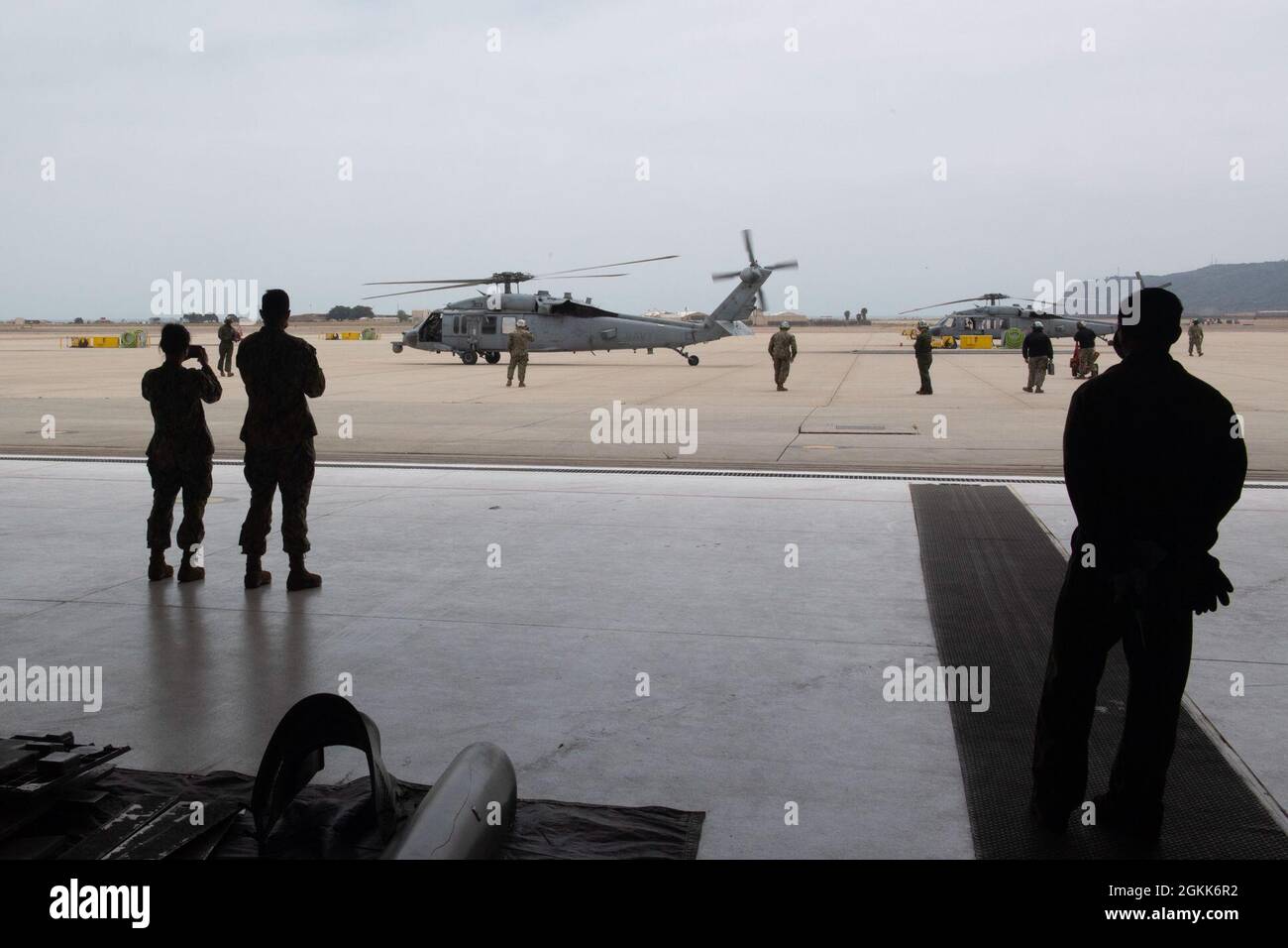 210512-N-NI420-0155 SAN DIEGO (MAY 12, 2021) People watch from the ...