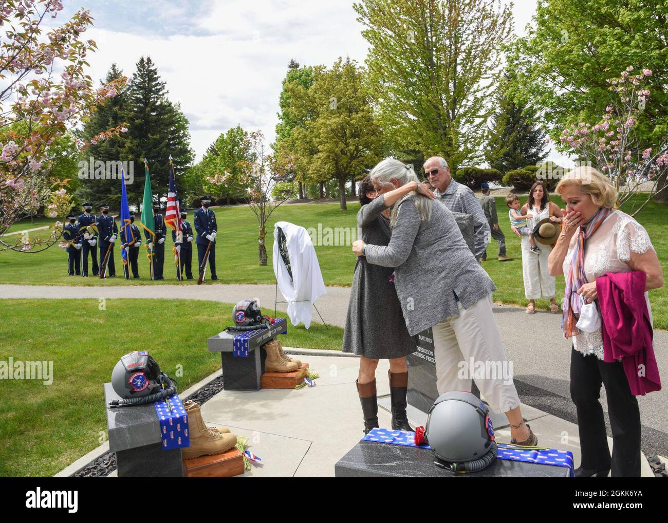 Family members of the deceased crew of Shell 77 pay their respects at ...