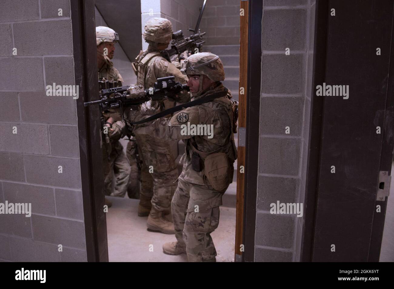 Soldiers continue to clear rooms individually while steadily moving ...