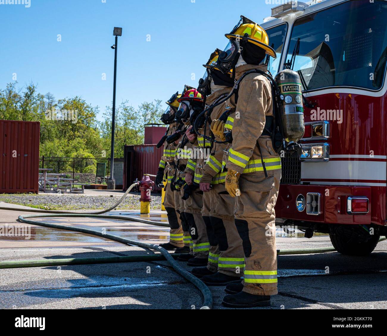 Pennsylvania Air National Guardsmen stand by performing as the rapid ...