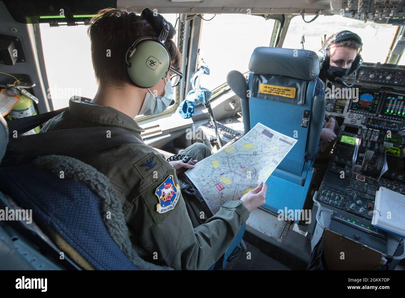 Hunter Willis views the flight path of the aircraft before taking off ...