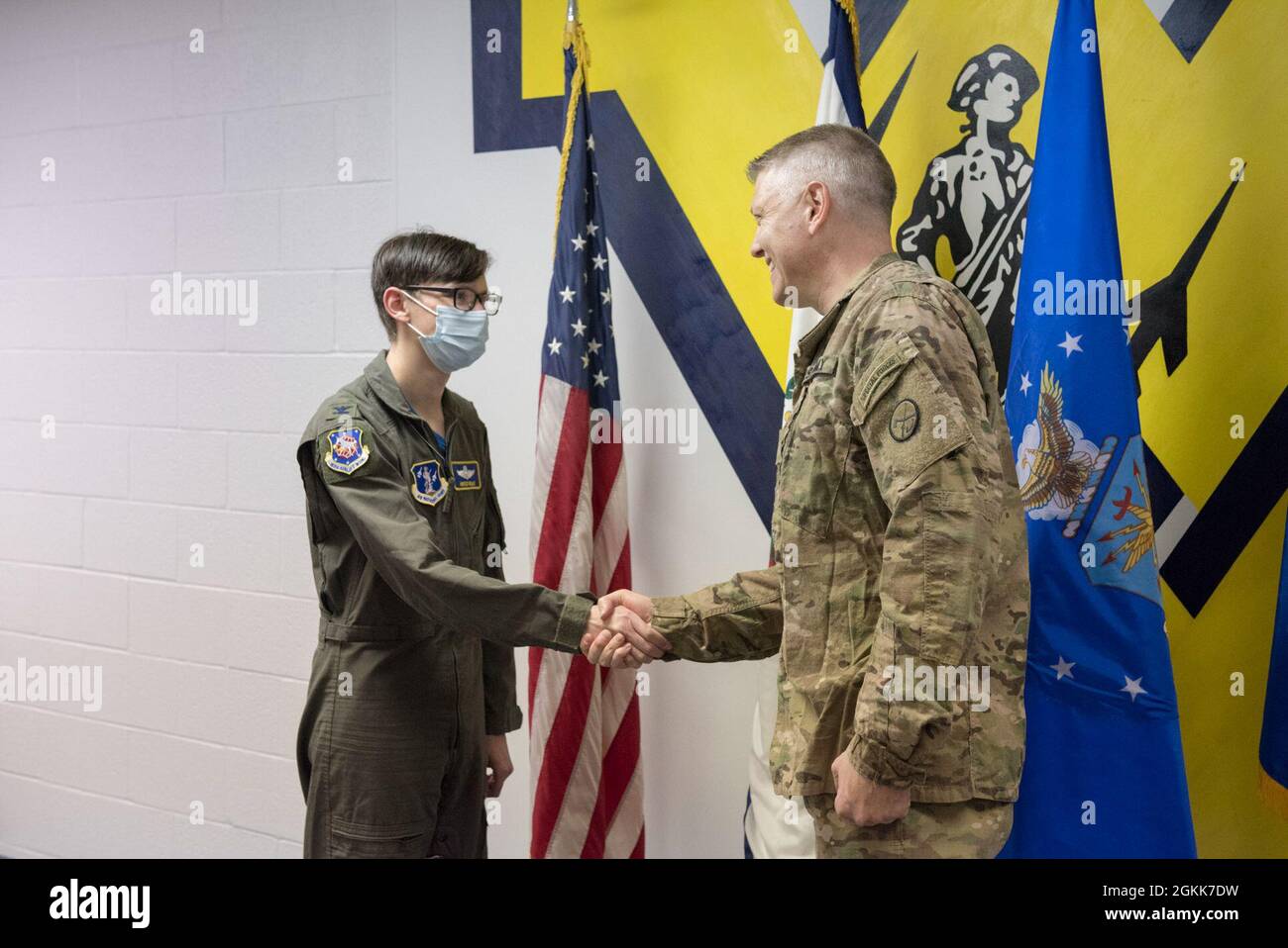 Hunter Willis congratulates his father, U.S. Army Lt. Col. Tom Willis ...