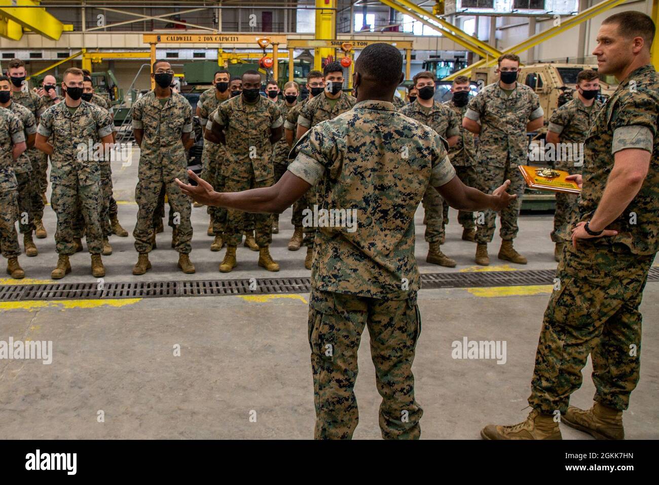 U.S. Marine Cpl. Kenneth L. Robinson, a motor vehicle technician, with ...