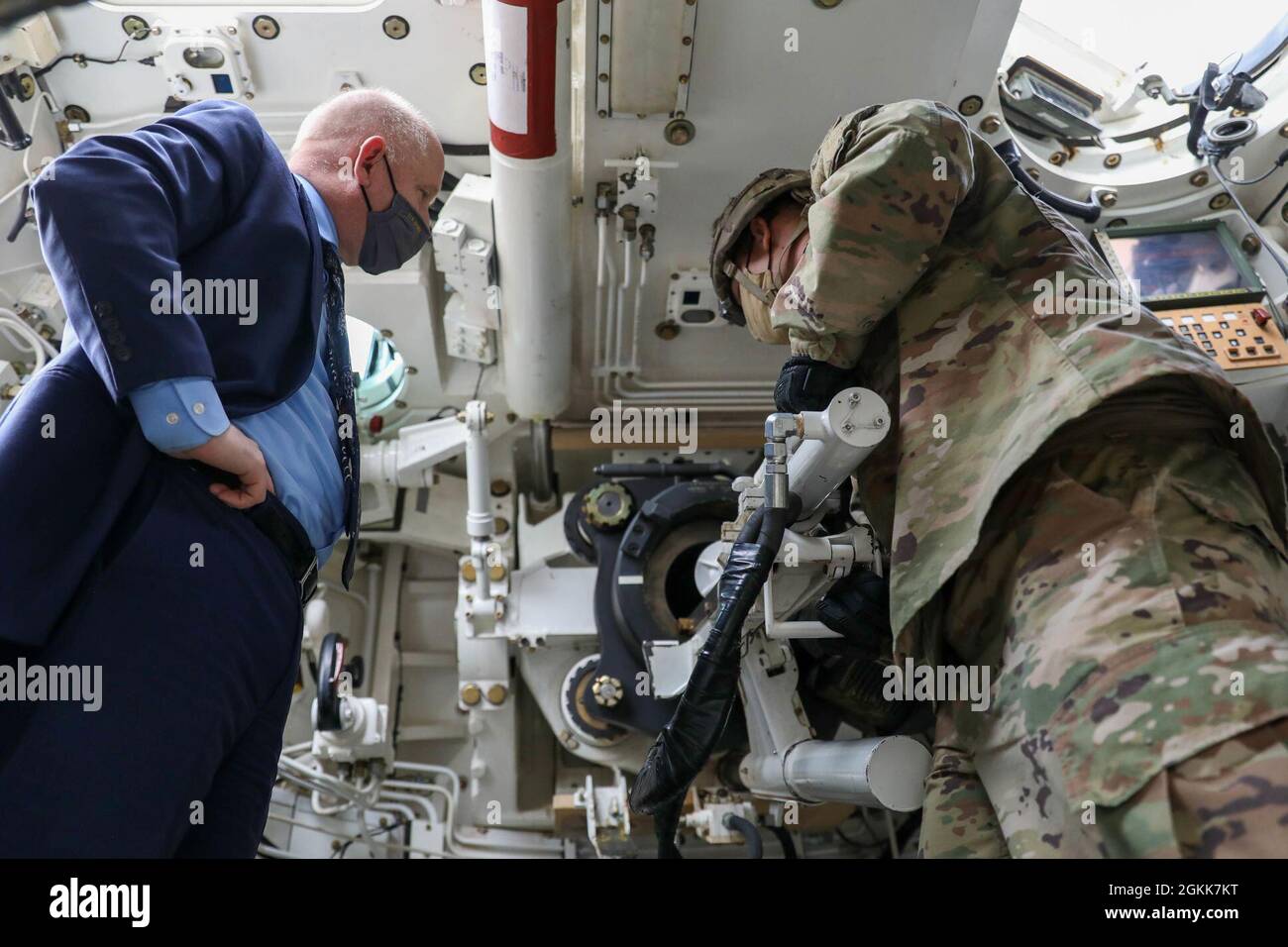 Acting Secretary of the Army John E. Whitley and a Soldier assigned to ...