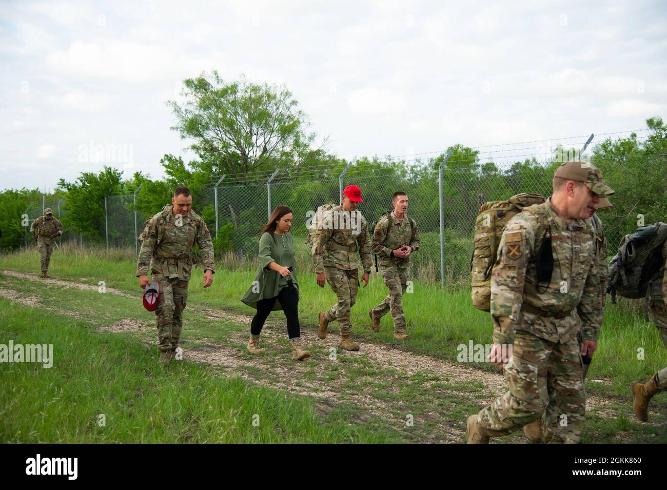 Joint Base San Antonio volunteers participate in a 5K ruck march ...