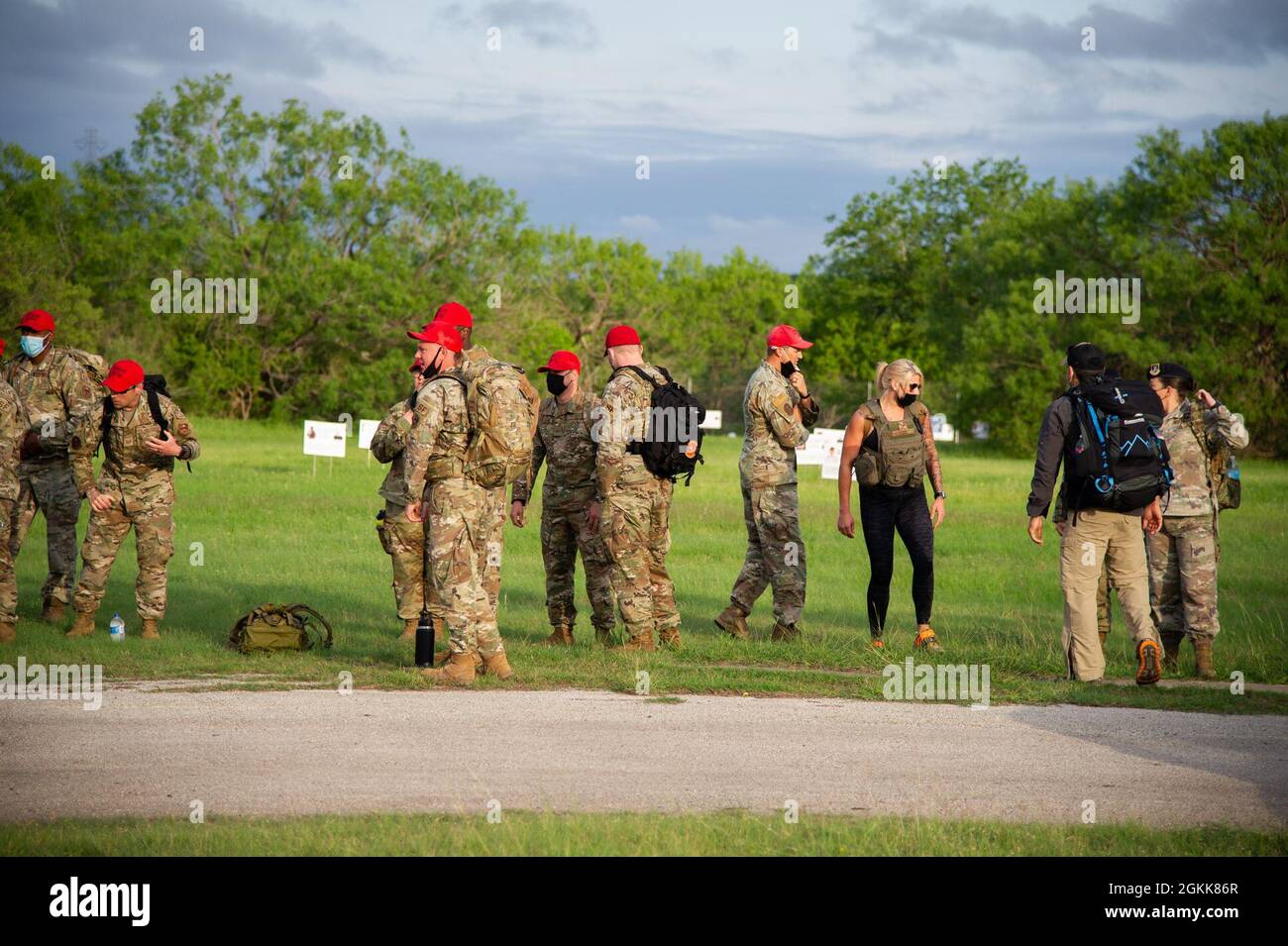 Joint Base San Antonio volunteers form up for a 5K ruck march ...