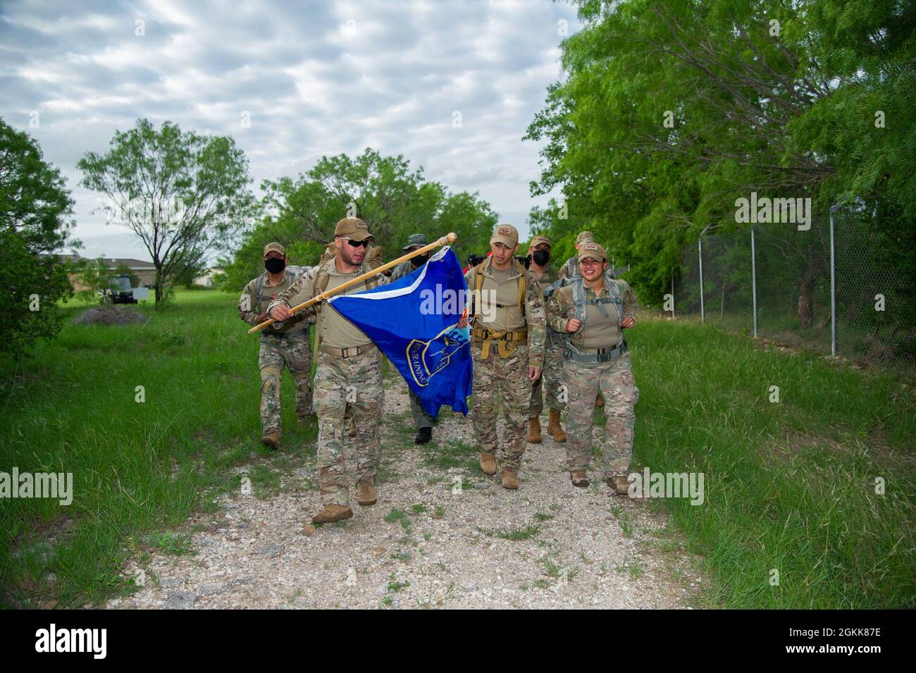 Joint Base San Antonio volunteers participate in a 5K ruck march ...