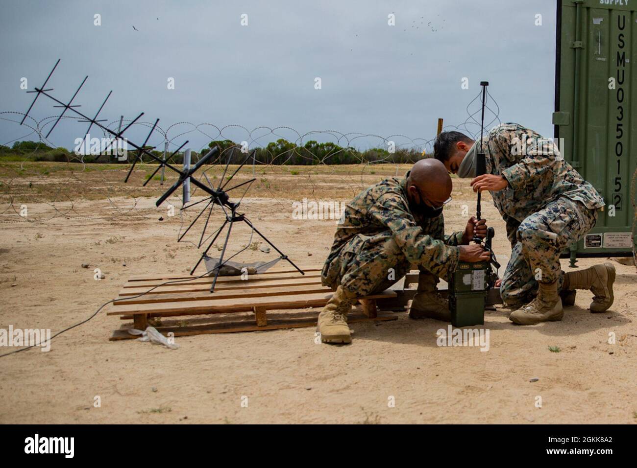 U.S. Marine Corps Lance Cpl. Adrian B. Powell, a transmissions operator ...