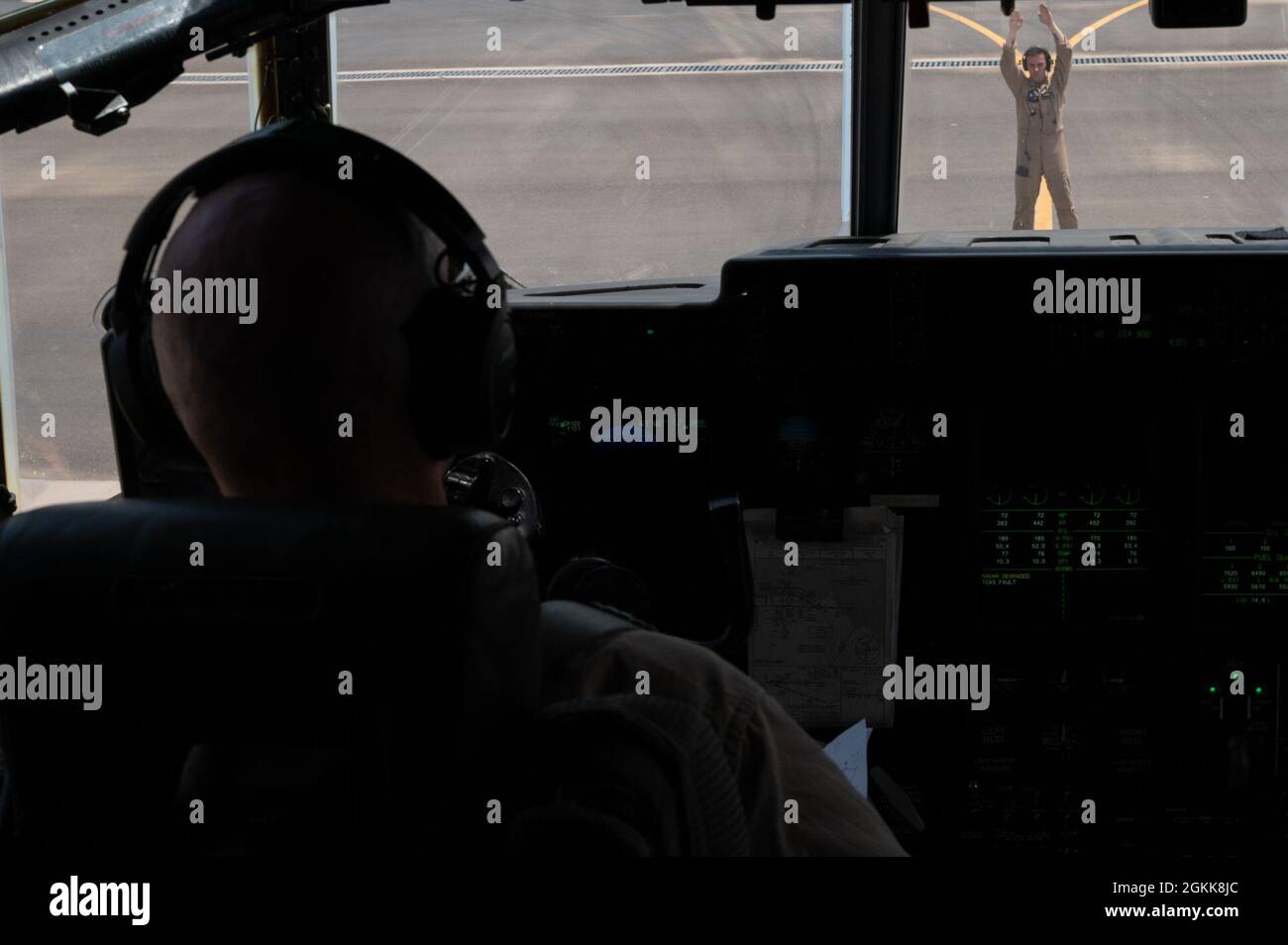 U.S. Marine Corps Cpl. Corey Griffith, a KC-130J loadmaster assigned to ...