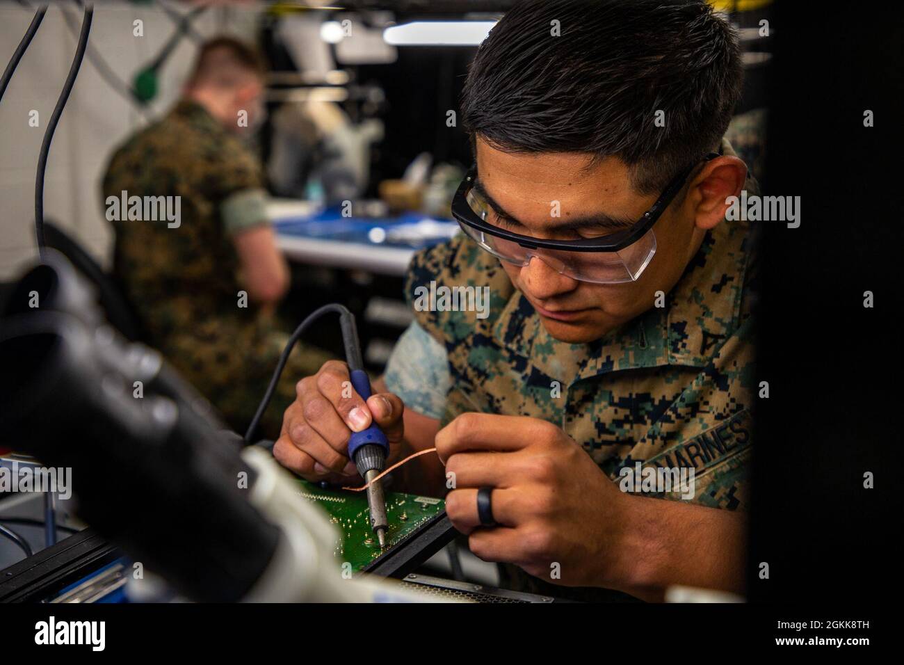 U.S. Marine Lance Cpl. LuisDiego N. Riquelme, a Ground Electronics ...