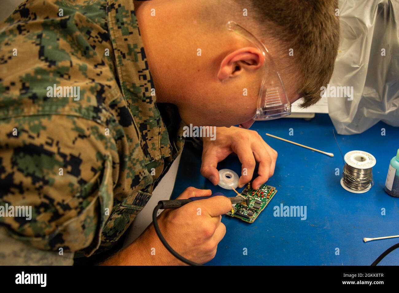 U.S. Marine Corps Lance Cpl. Thomas T. Hennigan, a Ground Electronics ...