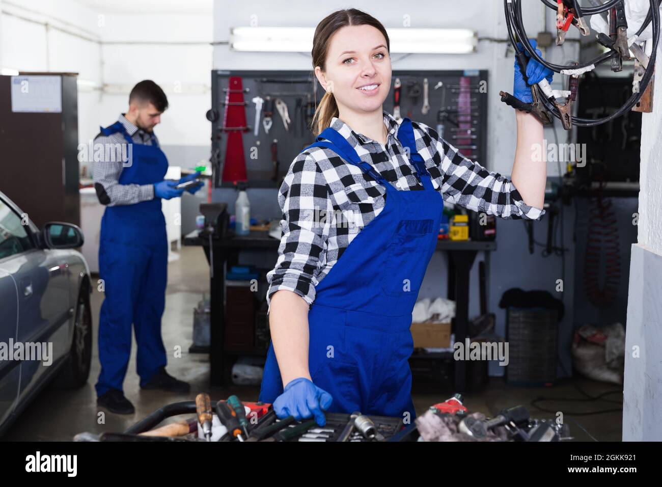 Hand woman instruments repair hi-res stock photography and images - Alamy