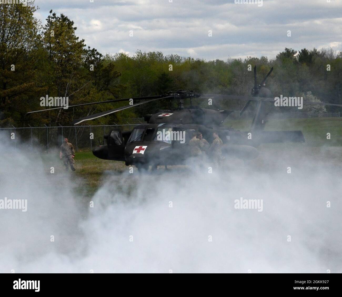 Airmen from the 104th Fighter Wing respond to a simulated downed ...