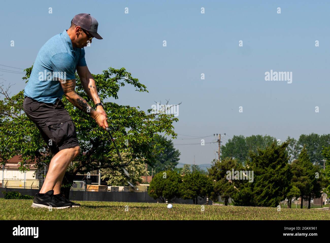 Lt. Col. David Lycan, 51st Security Forces Squadron commander, tees off ...