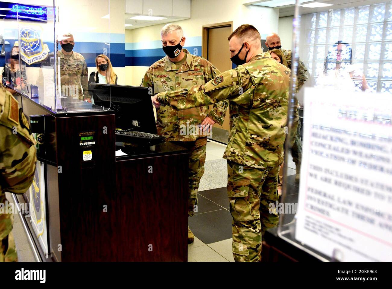 SSgt. Justin McDonald, 735th AMS, walks Maj. Gen. Mark Camerer through ...