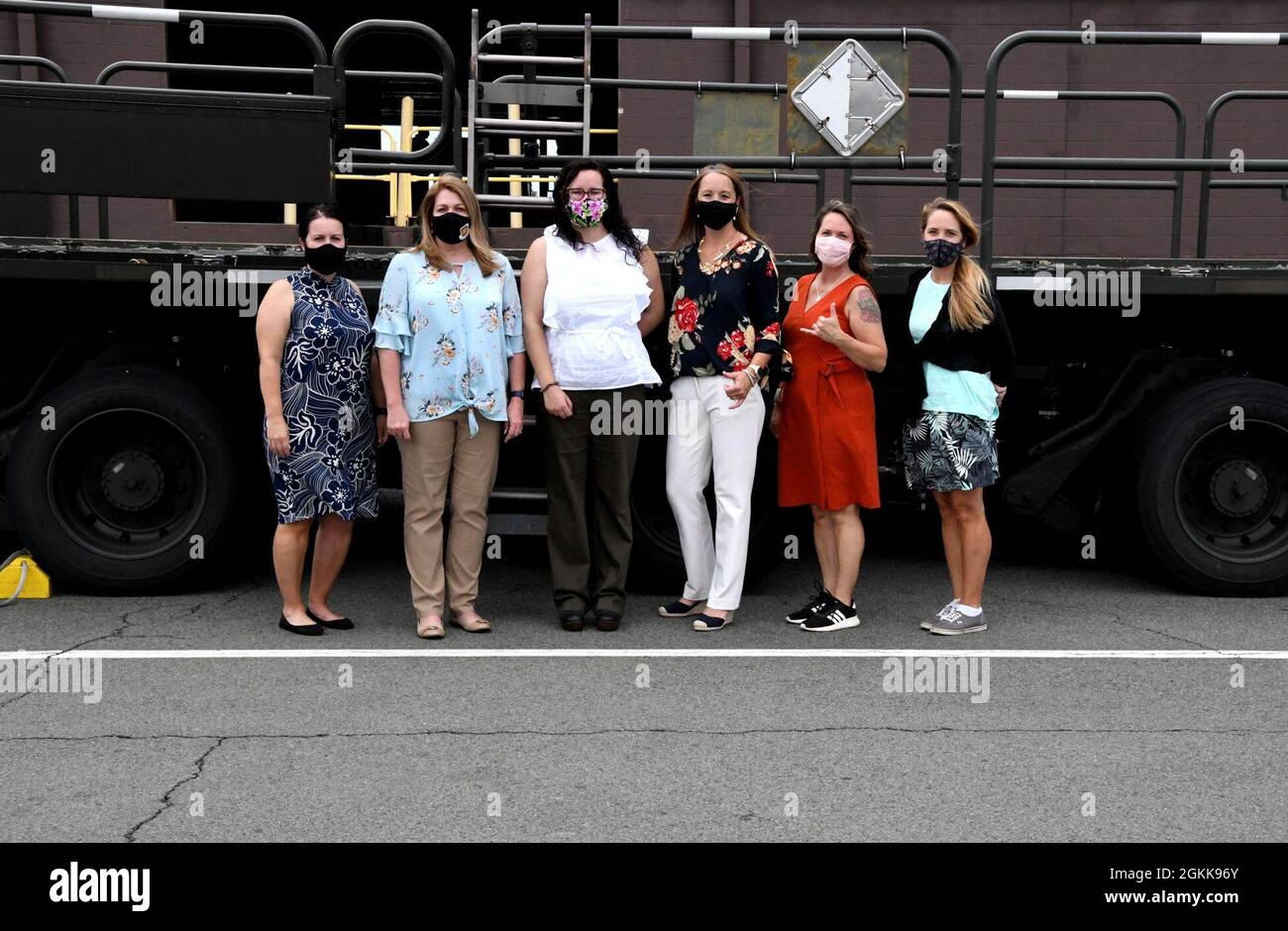 Spouses from the U.S. Air Force Expeditionary Center pose with spouses ...