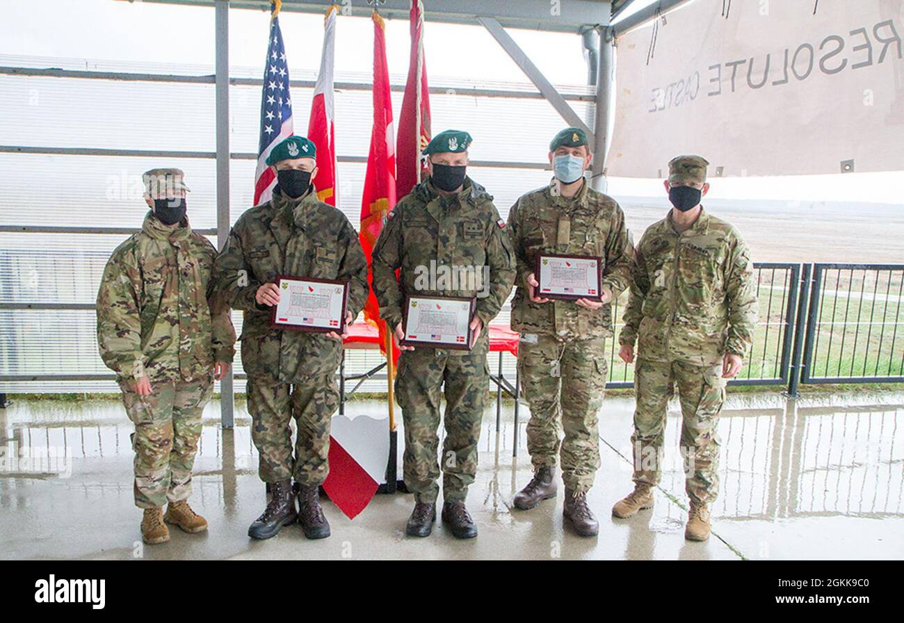 Leaders from Polish and Danish military engineering units display ...