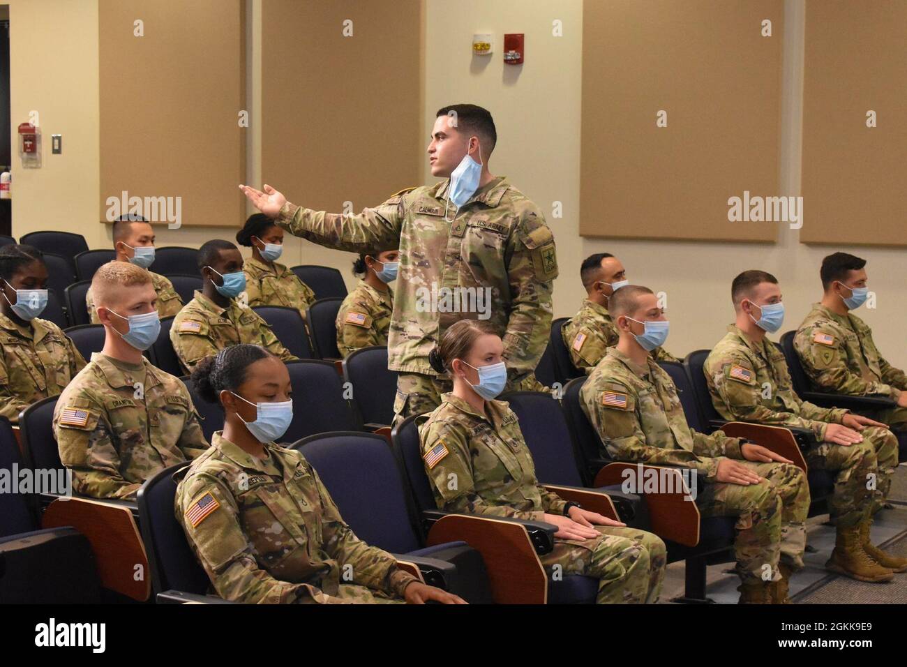 Pfc. Mason Calhoun, introduces his Family members during the Advanced ...