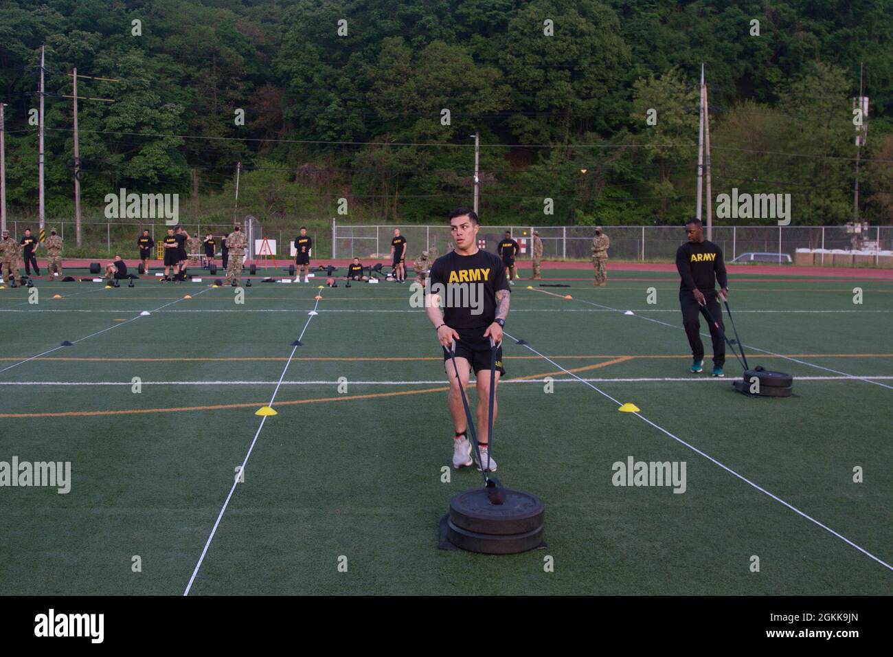 Soldiers conduct the sprint drag carry portion of the Army Combat ...