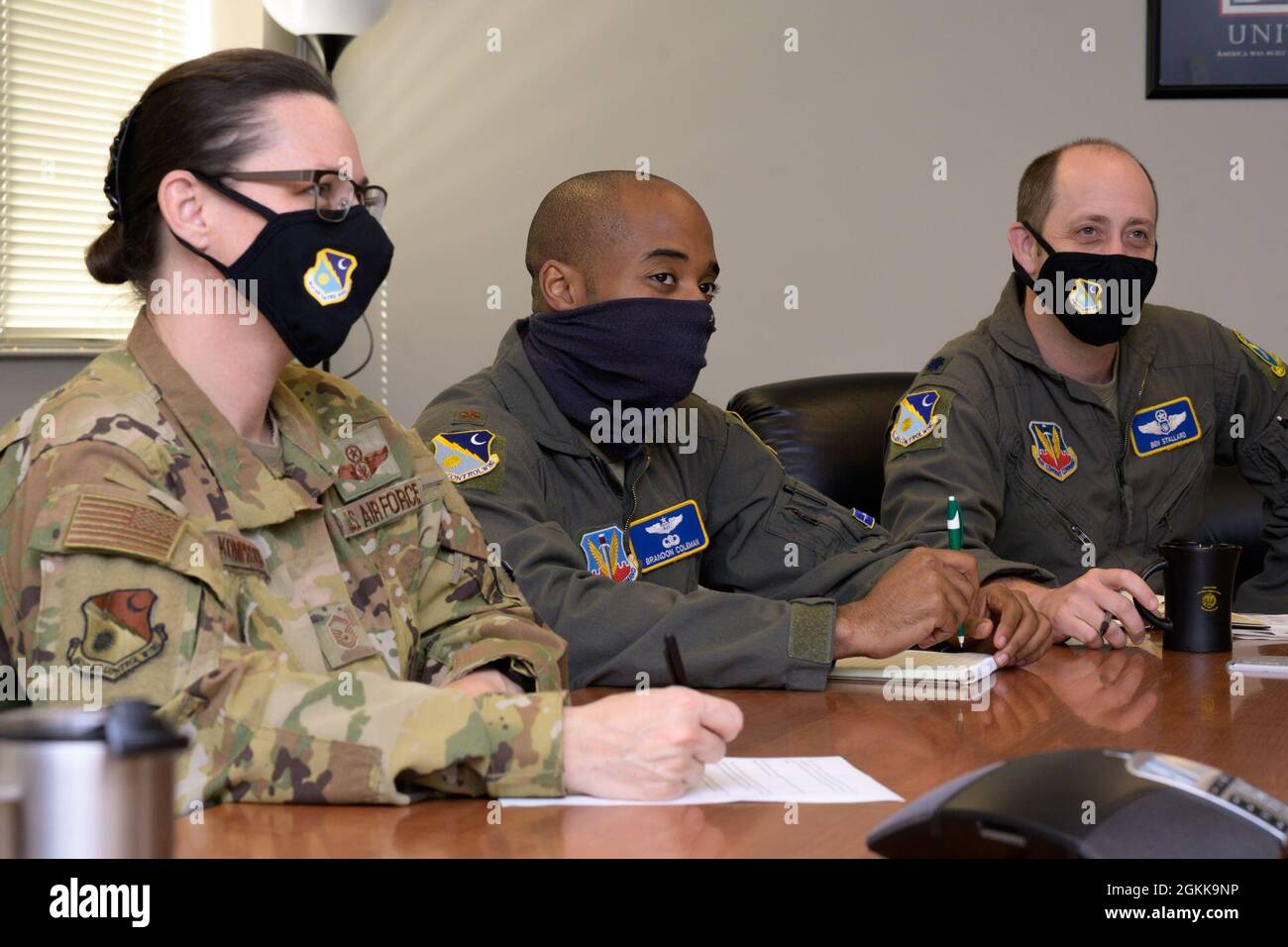 U.S. Air Force Master Sgt. Capri Komprood, left, noncommissioned ...