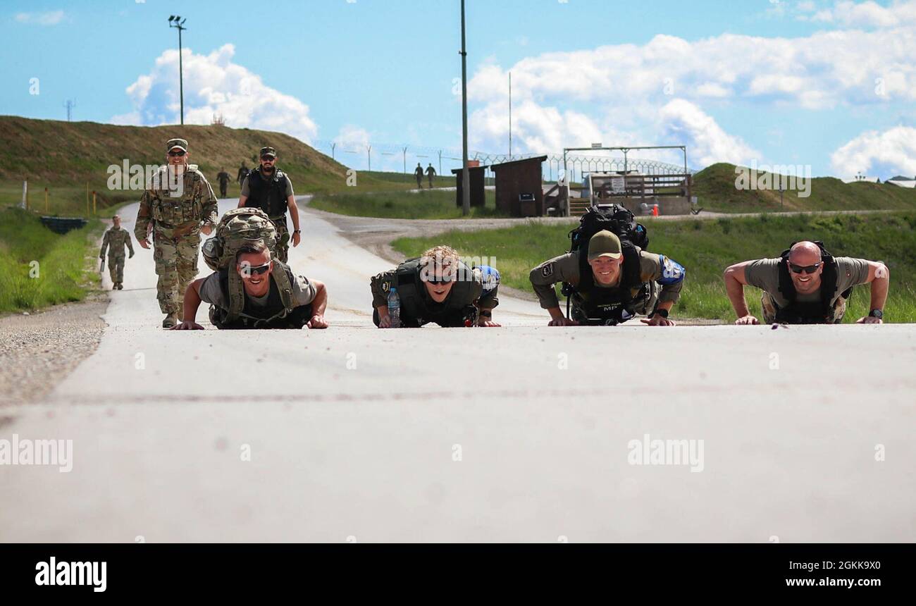 Swiss and Austrian Army military police soldiers assigned to the NATO ...