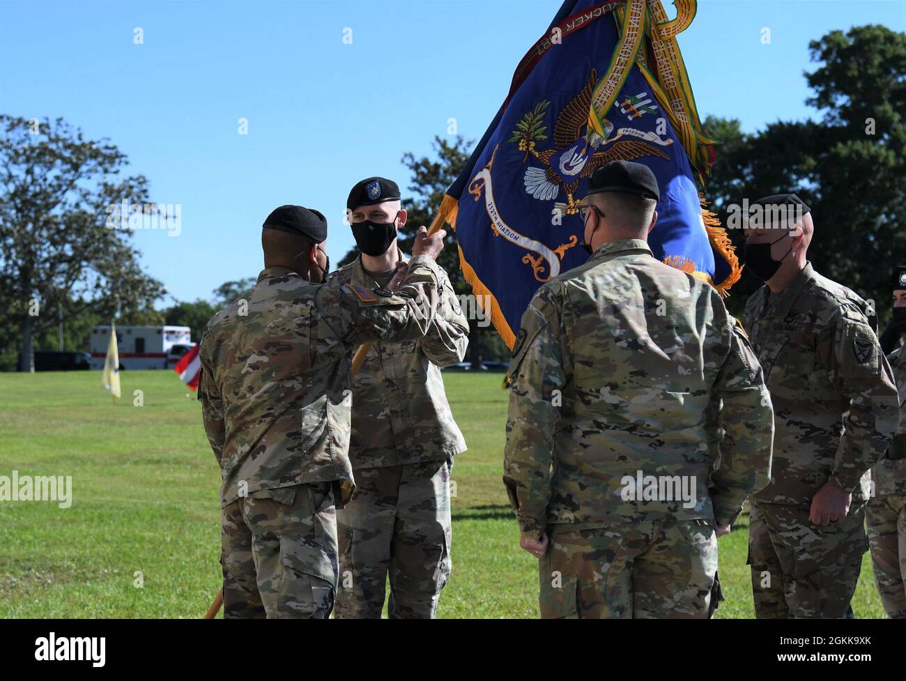 U.S. Army Lt. Col. Edward C. Adams accepts the 1st Battalion, 212th ...