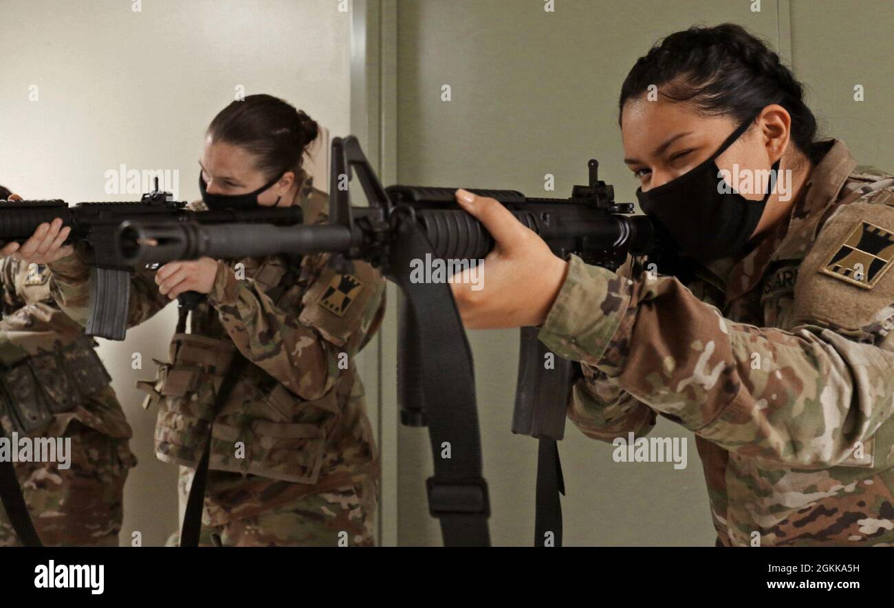 U.S. Army Reserve Spc. Jody Padgett, left, and Pvt. Dulce Higareda ...