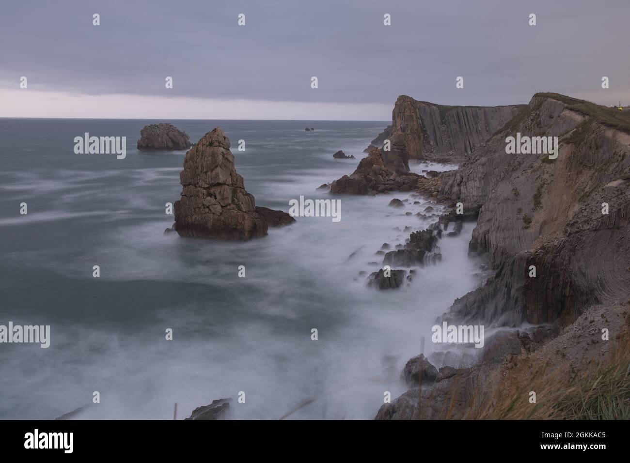 Beautiful view of rocky cliffs by the sea with long exposure Stock ...