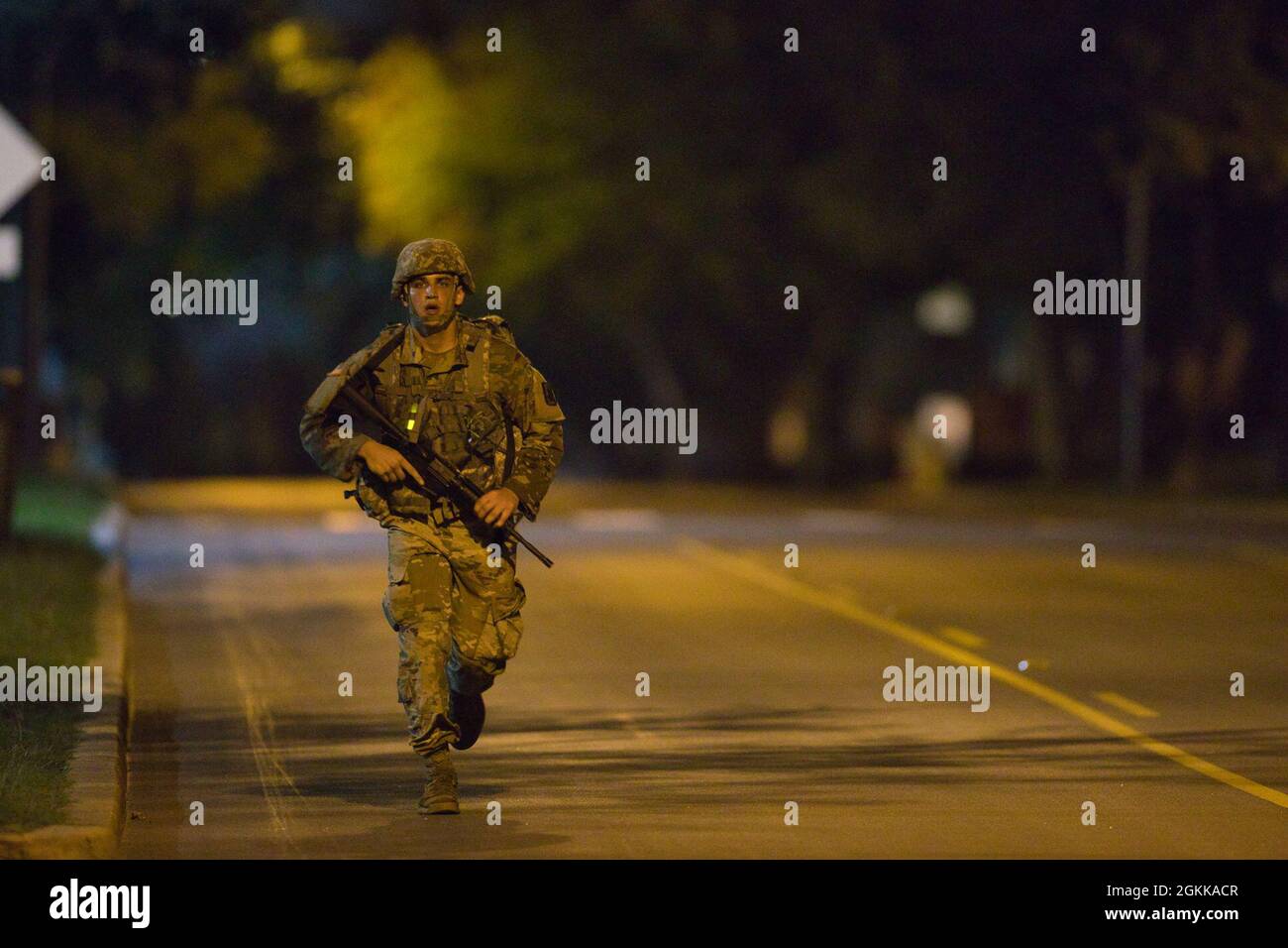 U.S. Army Spc. Justin Earnhart, U.S. Army South, sprints to the finish ...