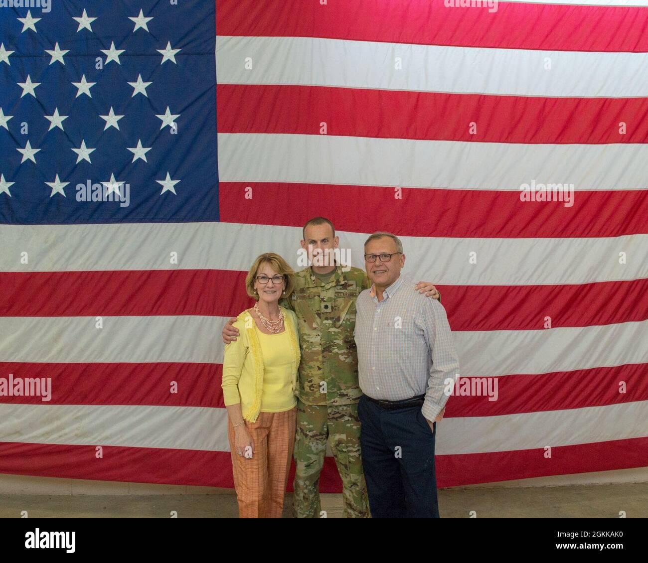 Lt. Col. Coningsby Burdon and his family celebrate his assumption of command over the 43rd ...