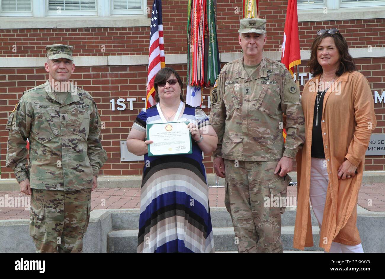 Mrs. Nancy Walton displays the commendation after being awarded the Patriotic Public Service ...