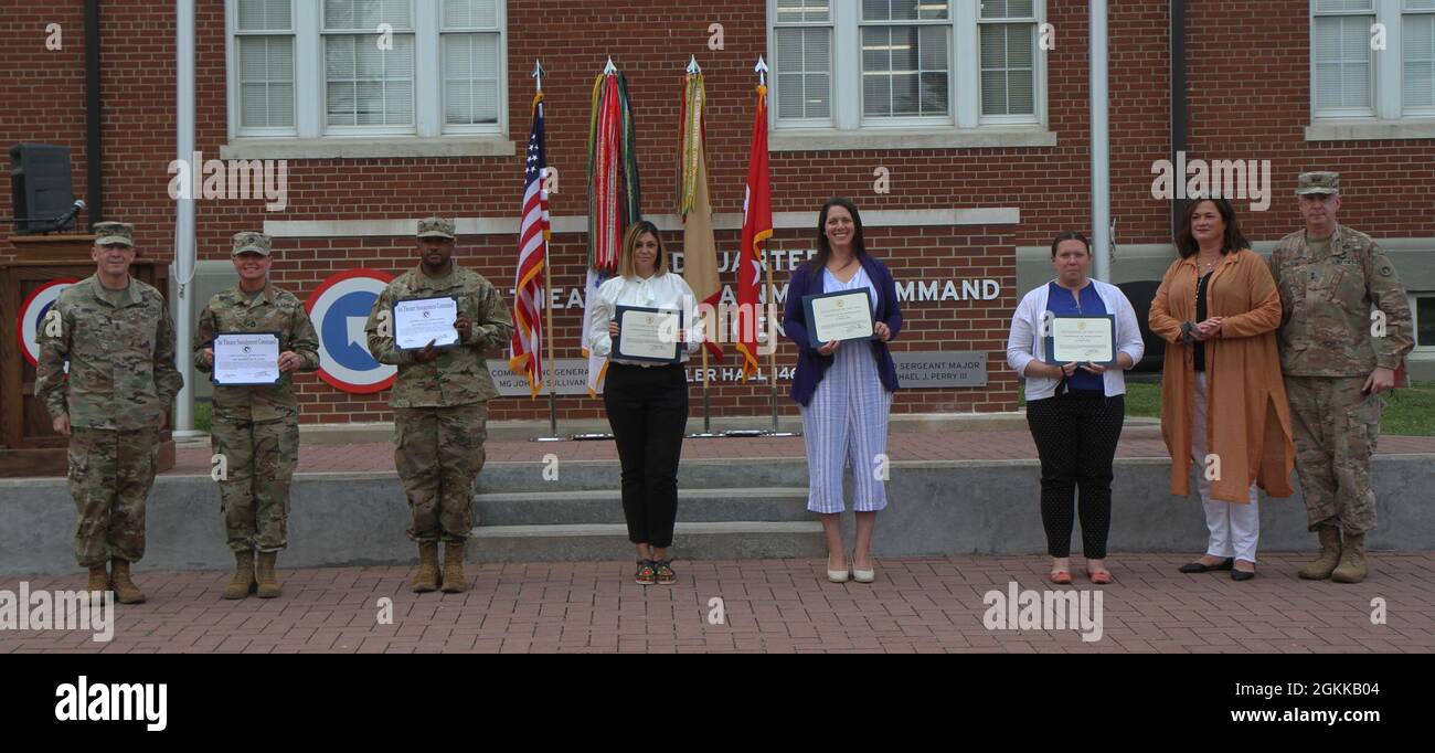 Soldiers and civilians display their Certificates of Appreciation with ...