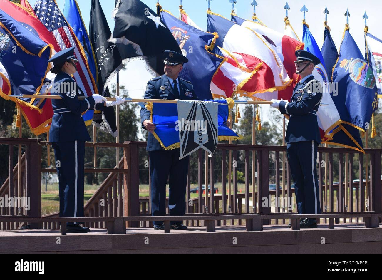 Col. Anthony Mastalir, Space Launch Delta 30 commander, furls the 30th ...