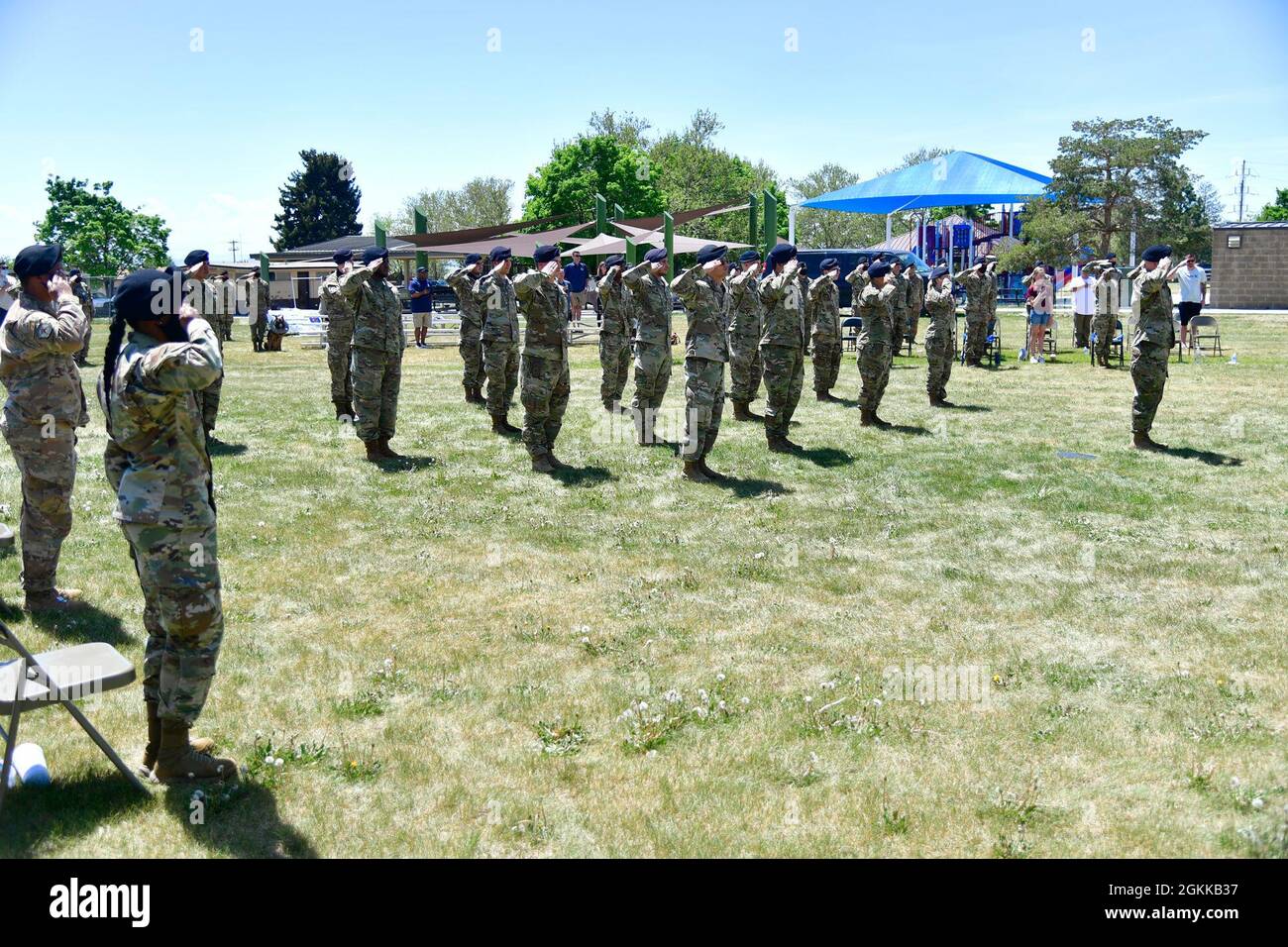 Airmen from the 75th Security Forces Squadron render a salute during a ...