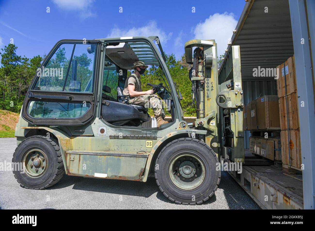 A U.S. Air Force stockpile management crew chief with the 18th ...