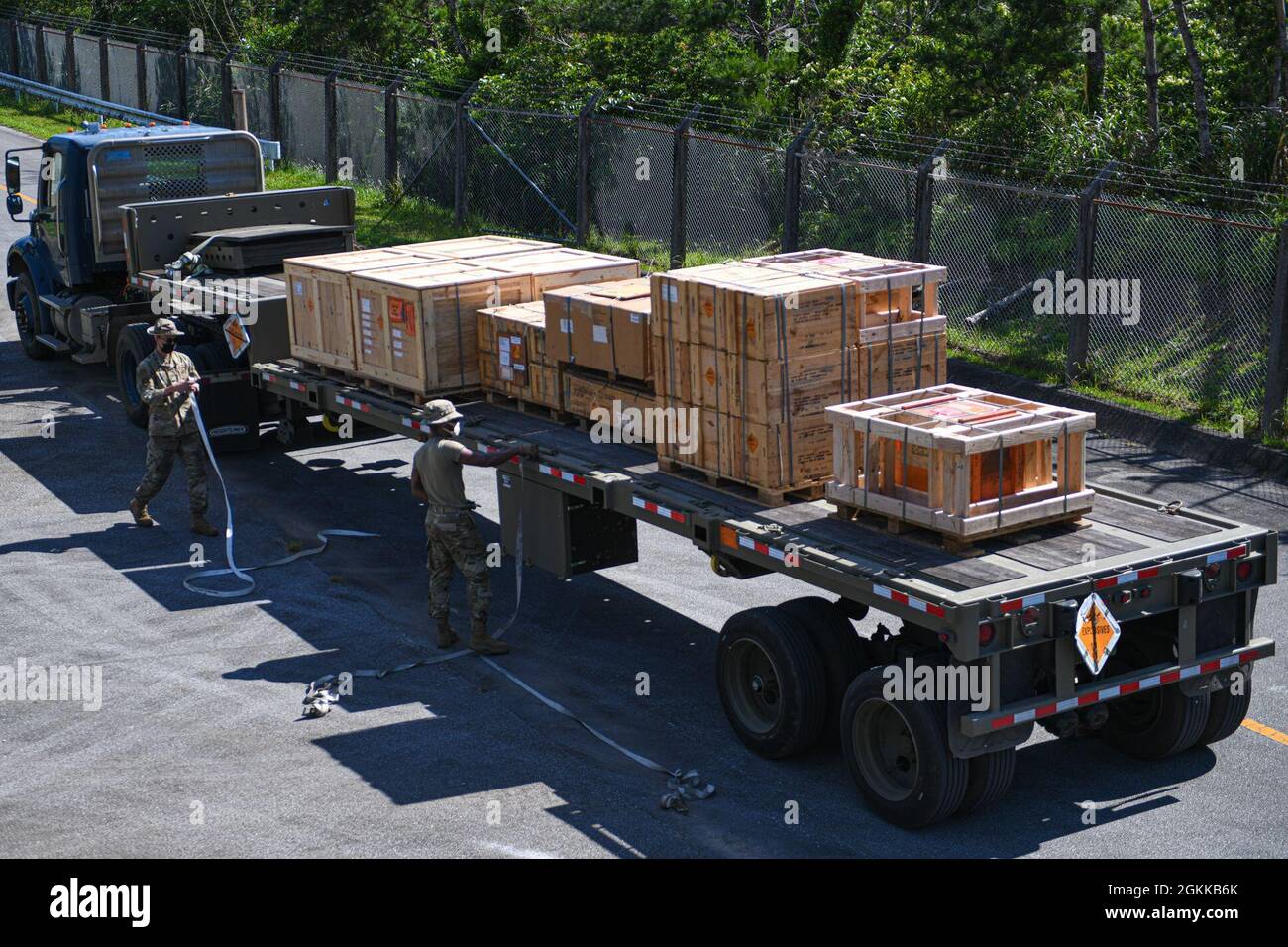 U.S. Air Force stockpile management crew chiefs with the 18th Munitions ...