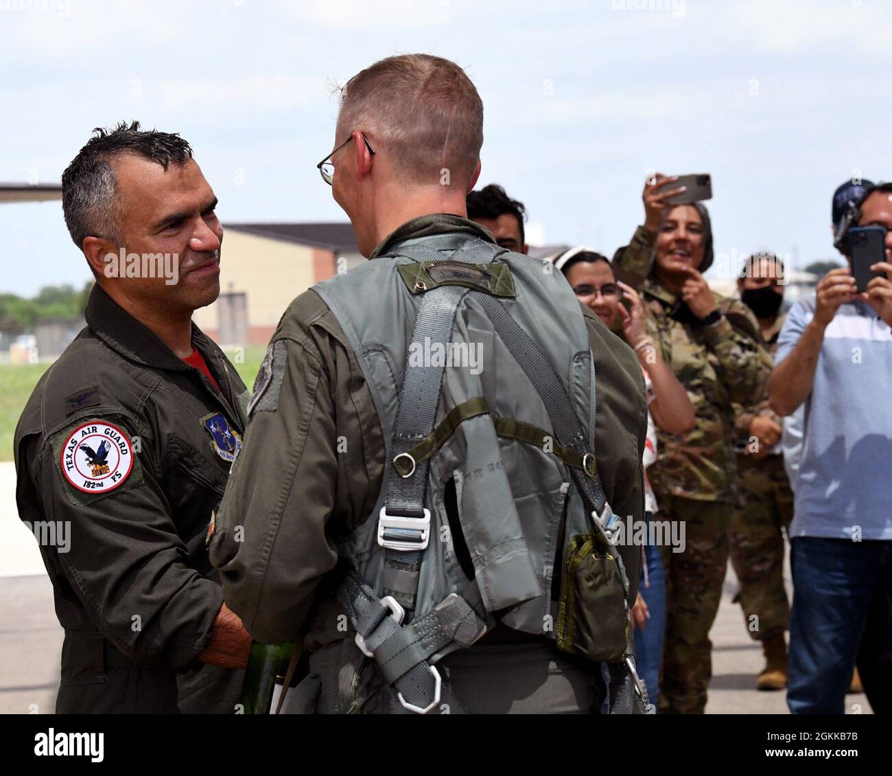 Col. Raul Rosario, 149th Fighter Wing commander, shakes hand with Col ...