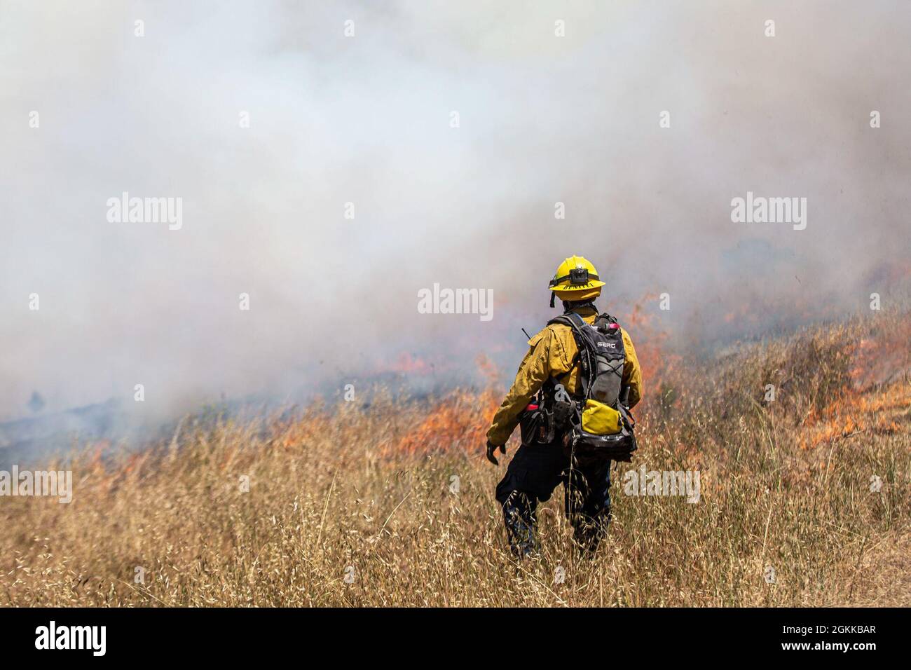 A firefighter with the Camp Pendleton Fire Department ignites dry ...